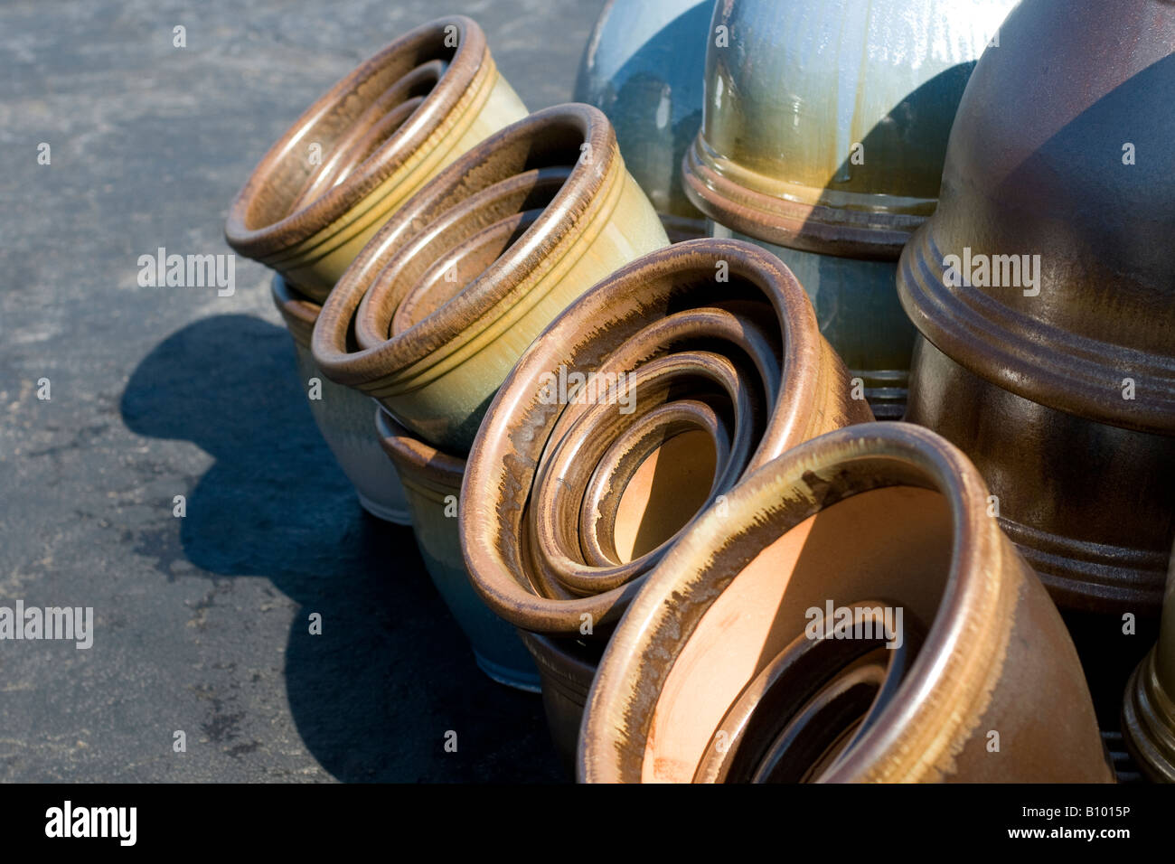 Row of glazed gardening pots Stock Photo - Alamy