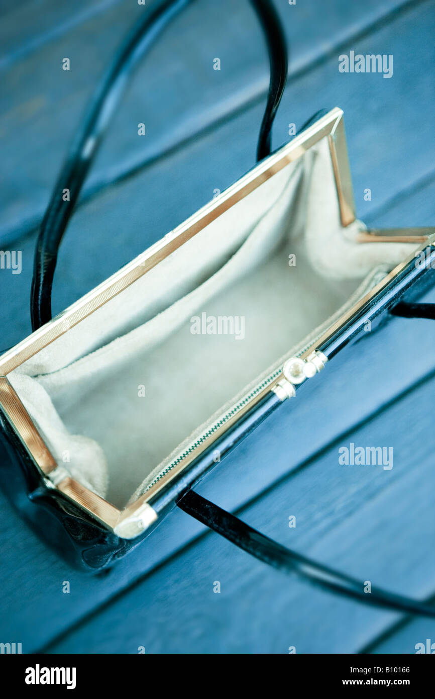 Empty vintage woman's handbag Stock Photo - Alamy