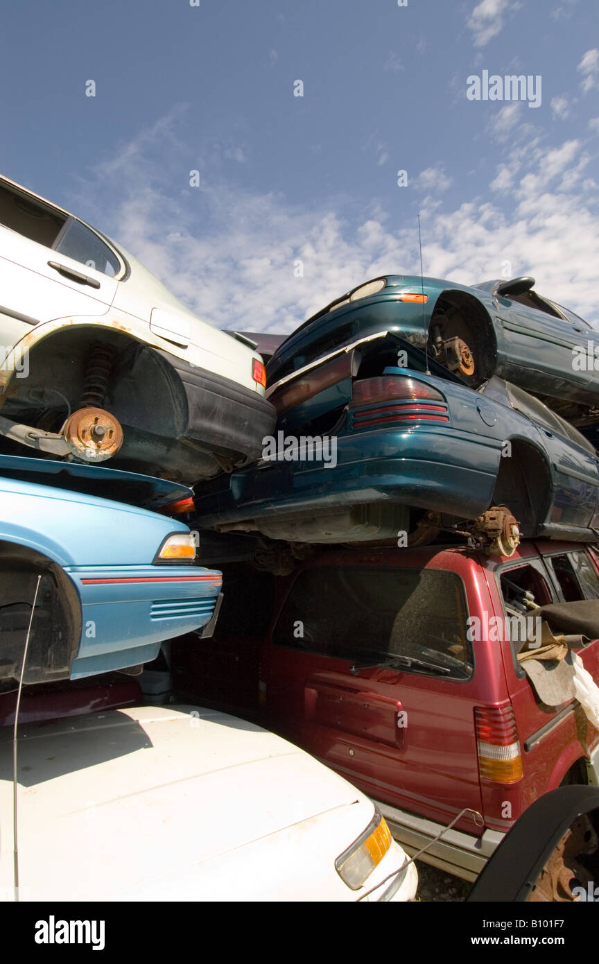 Smashed and crushed automobiles and parts in an Auto Salvage yard Stock ...