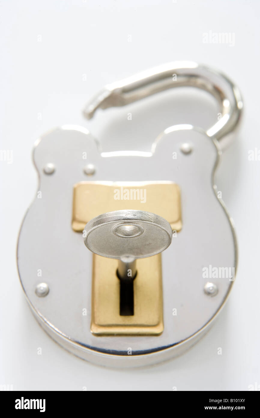 unlocked padlock with key on white background Stock Photo - Alamy