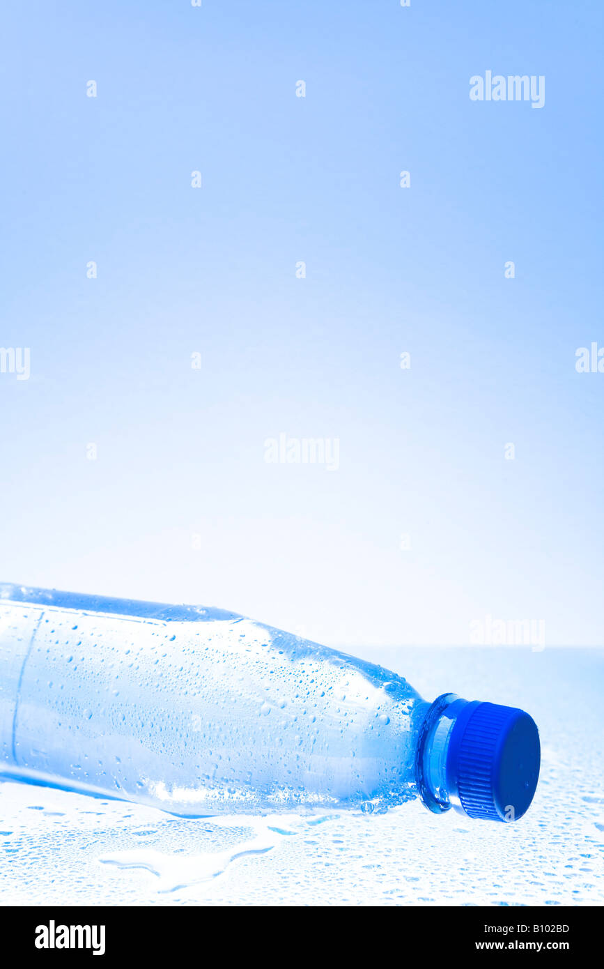 Wet plastic water bottle with water drops Stock Photo - Alamy