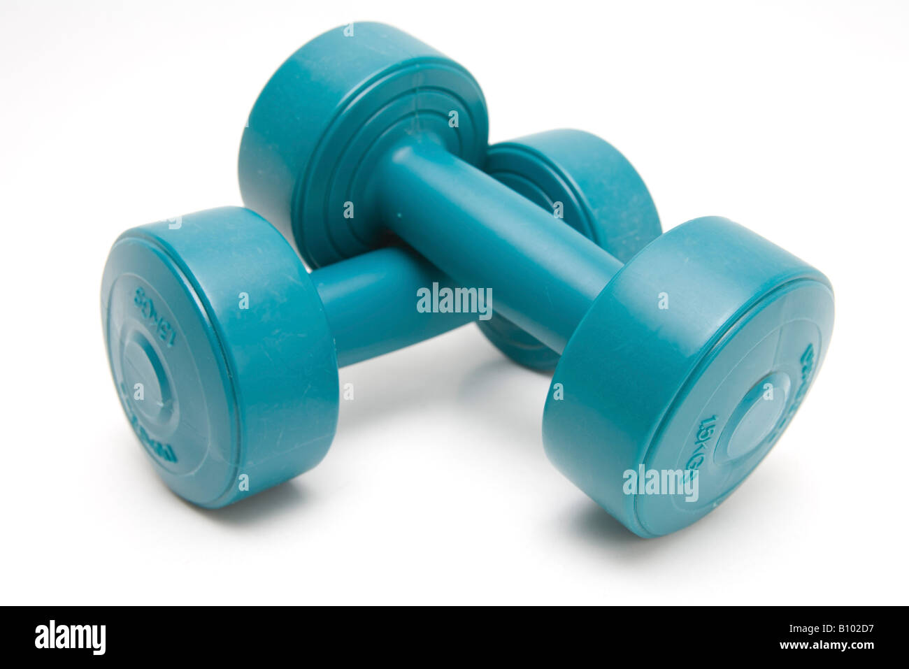Pair of hand weights on a white background Stock Photo - Alamy