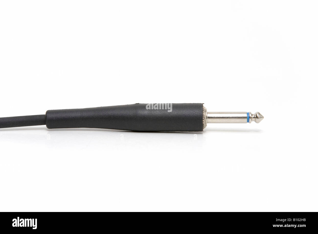 Guitar cable over white Stock Photo - Alamy