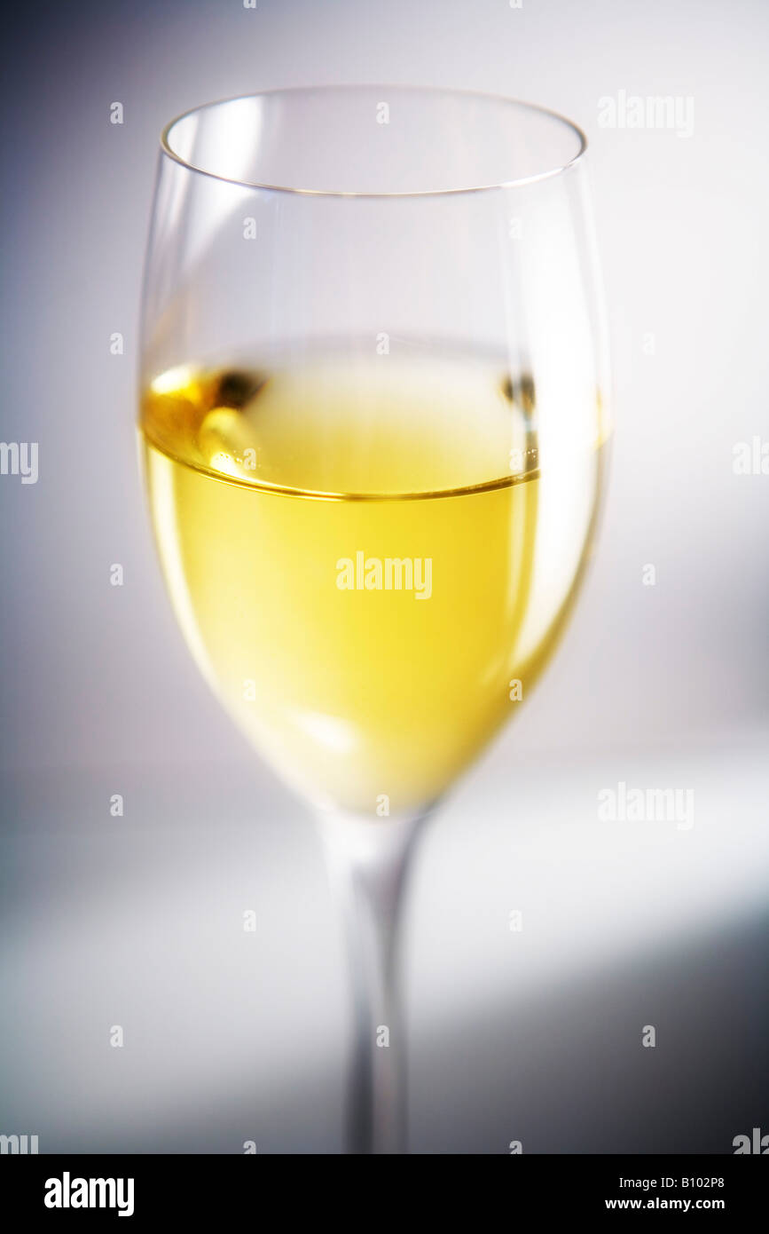 White wine in wine glass Stock Photo - Alamy