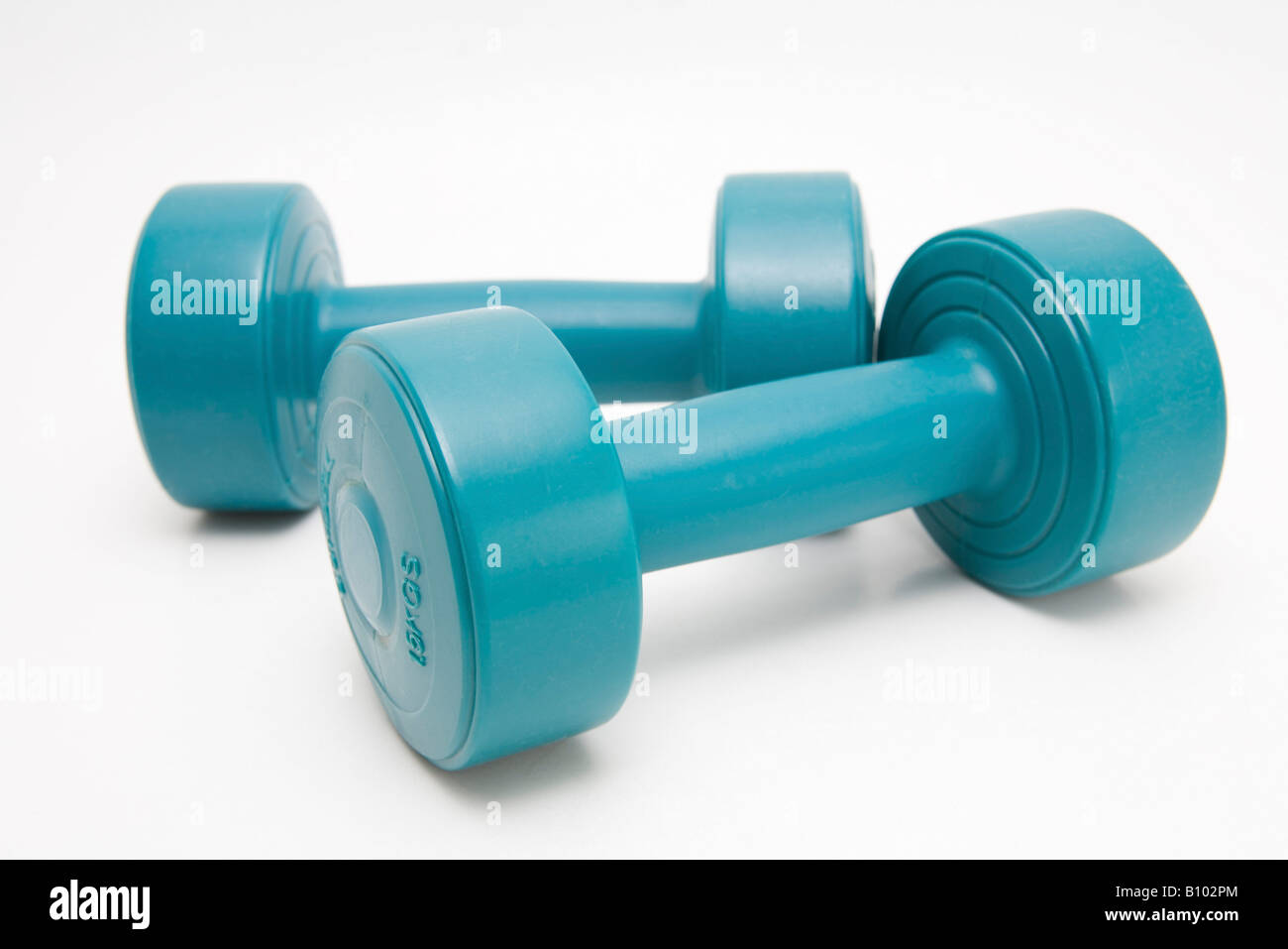 Pair of hand weights over white Stock Photo - Alamy