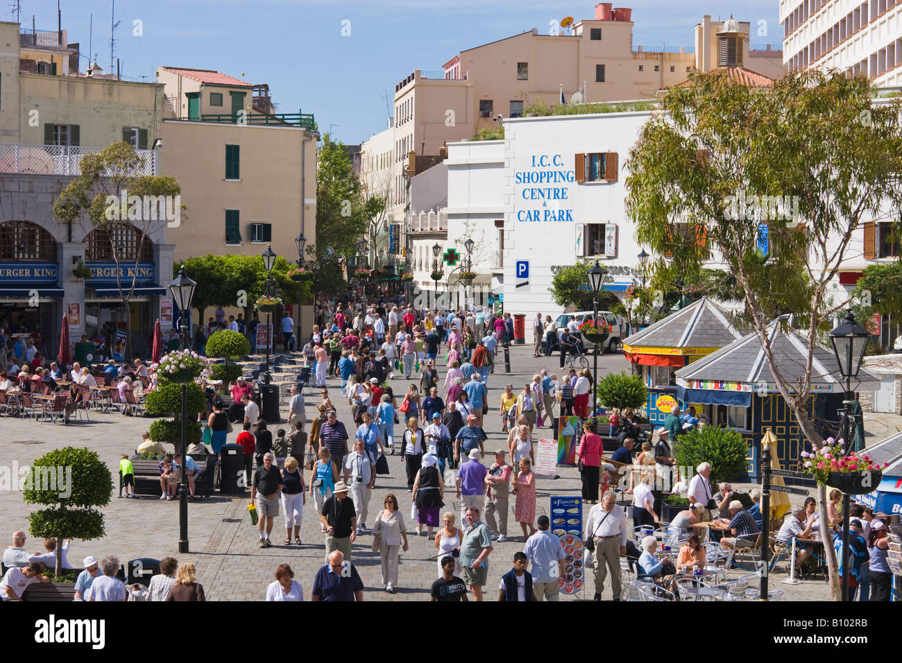 Gibraltar Cafe life and crowds in Casement Square Stock Photo - Alamy