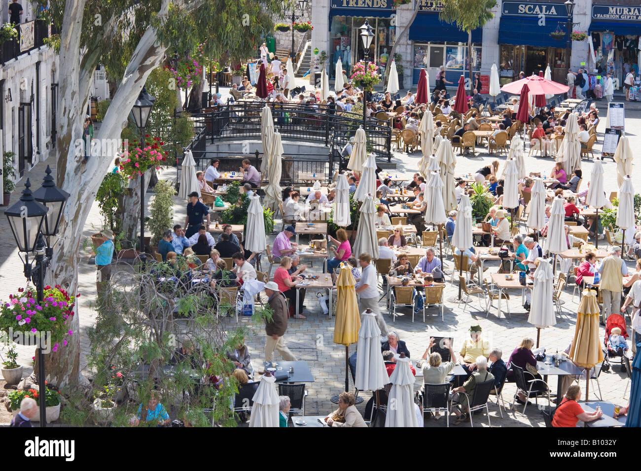 Gibraltar Cafe life and crowds in Casement Square Stock Photo - Alamy