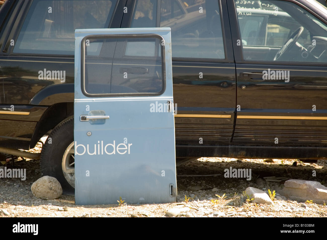 Smashed and crushed automobiles and parts in an Auto Salvage yard Stock ...