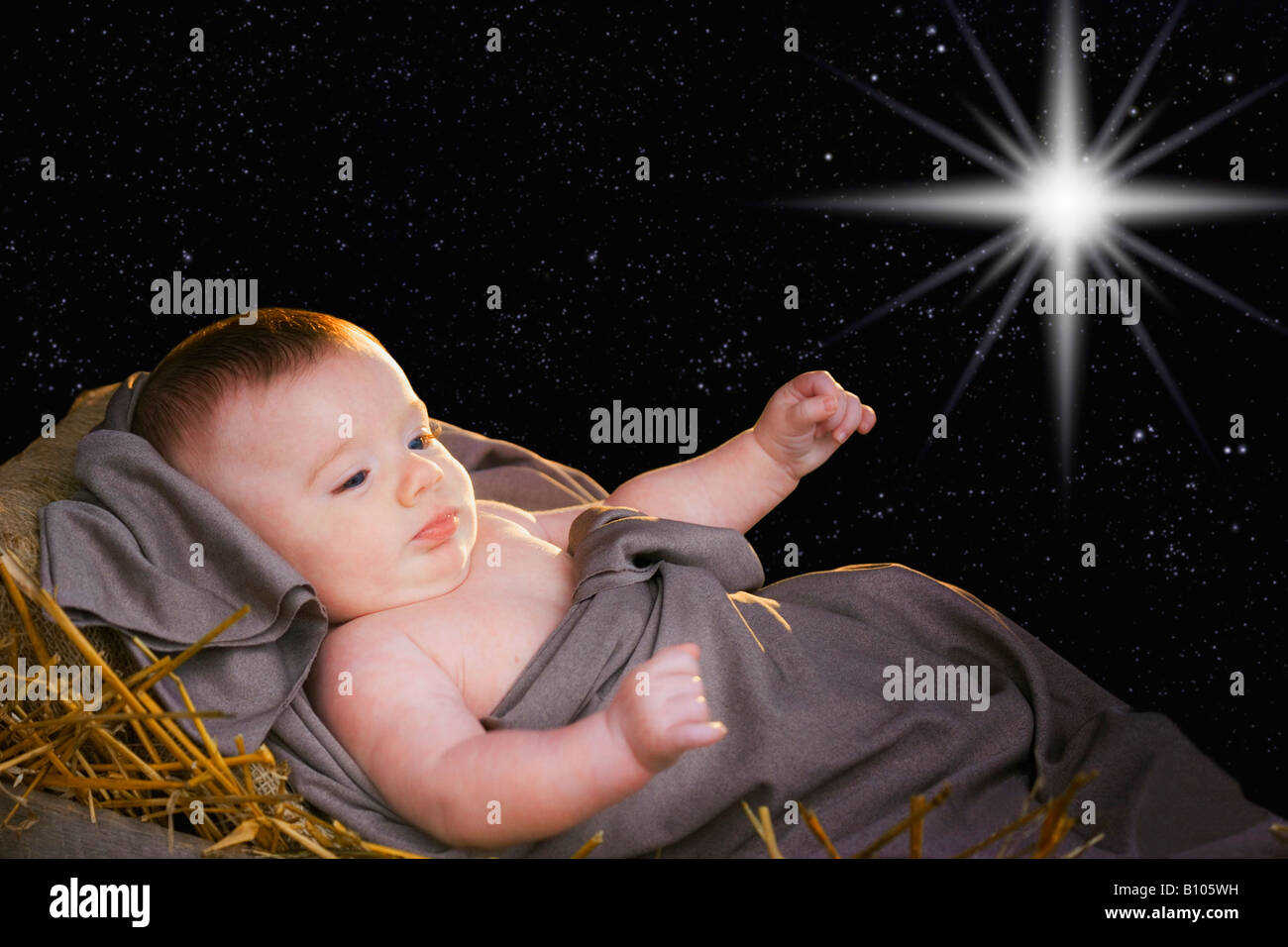 Baby Jesus in a manger Stock Photo - Alamy