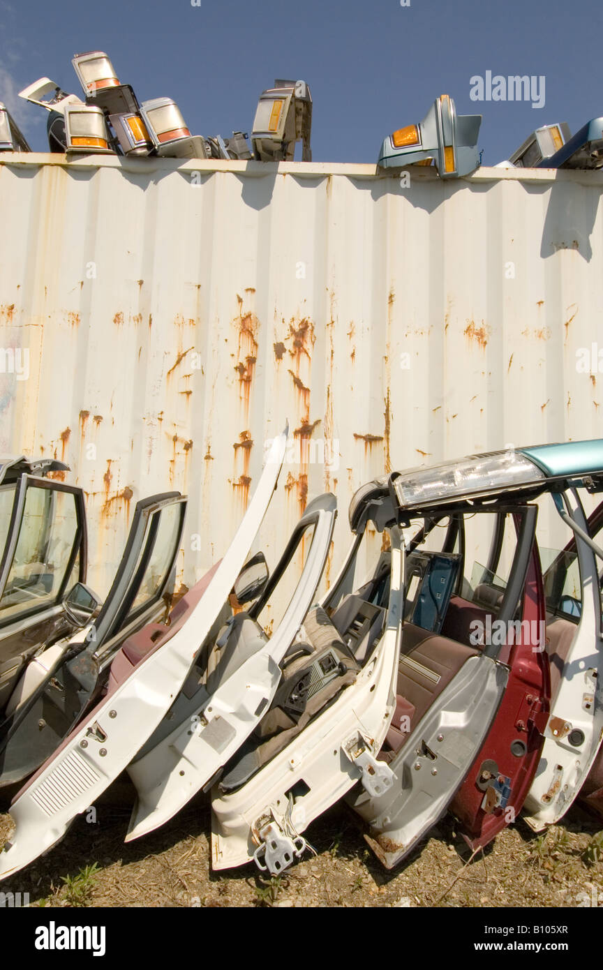 Smashed and crushed automobiles and parts in an Auto Salvage yard Stock ...