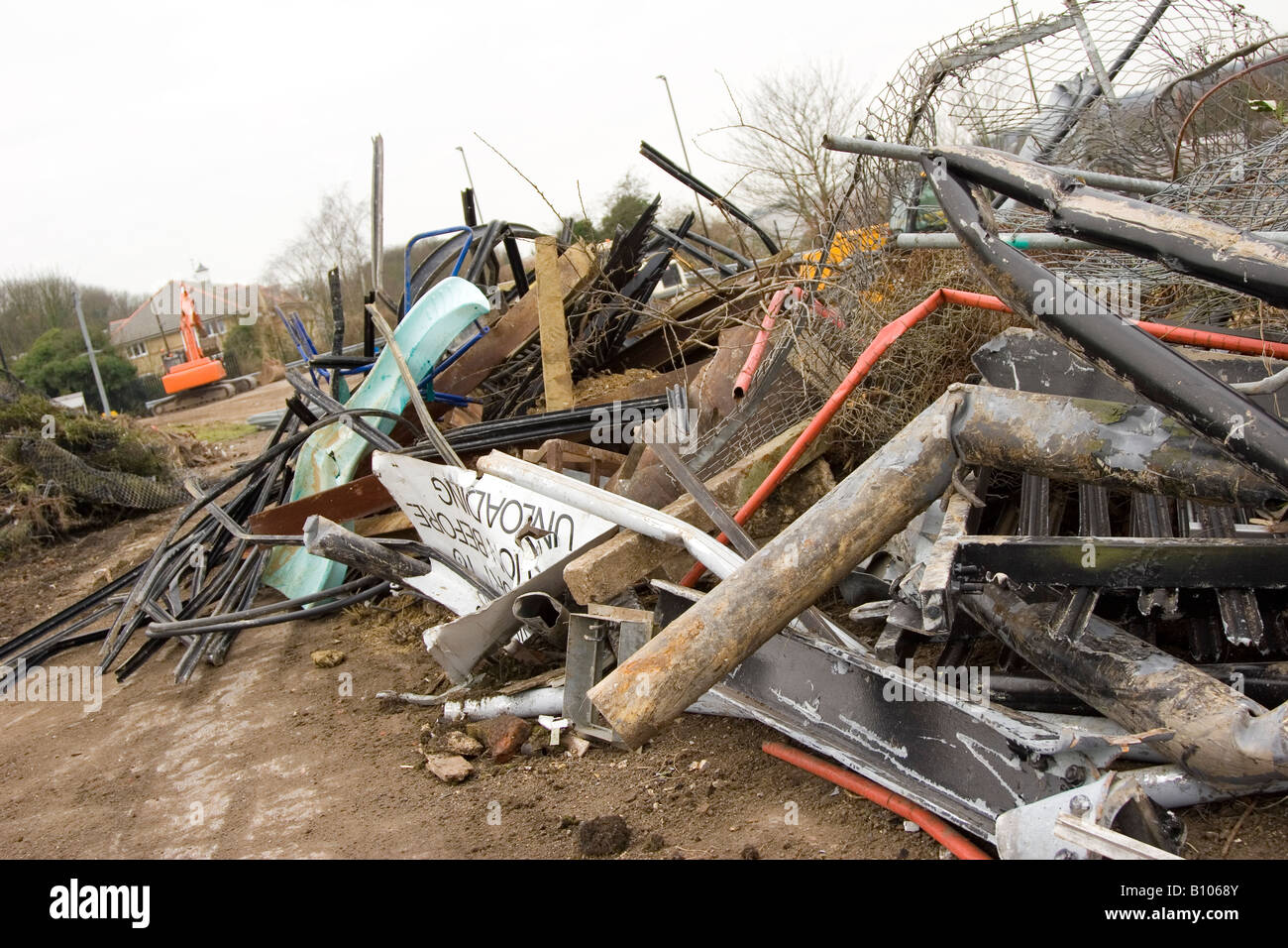 Pile of scrap metal and rubble stacked on ground outdoors Stock Photo ...