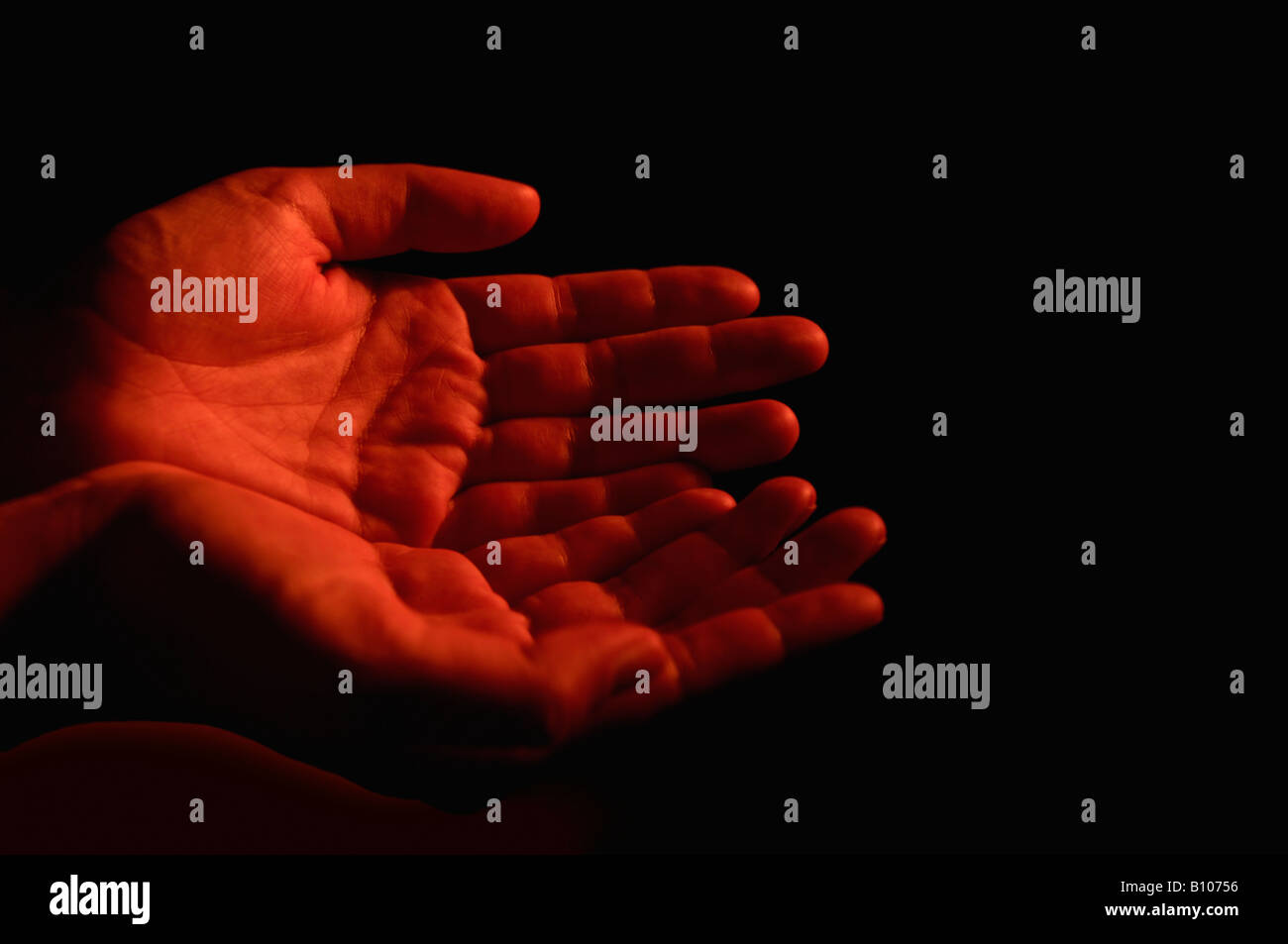 Hands open to receive Stock Photo - Alamy