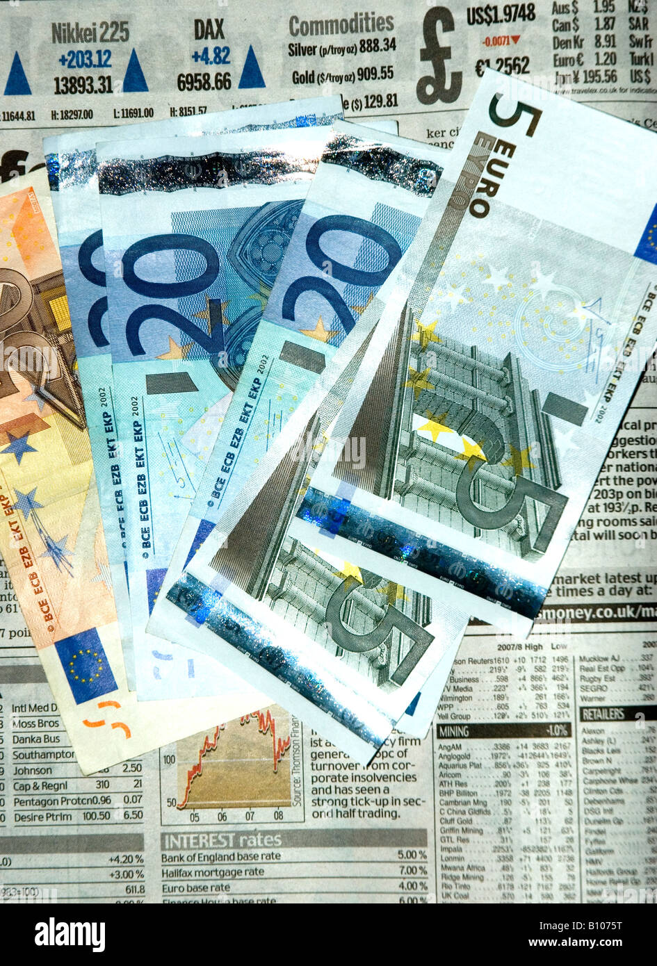 Collection of Euro currency Notes on Financial page of daily newspaper ...