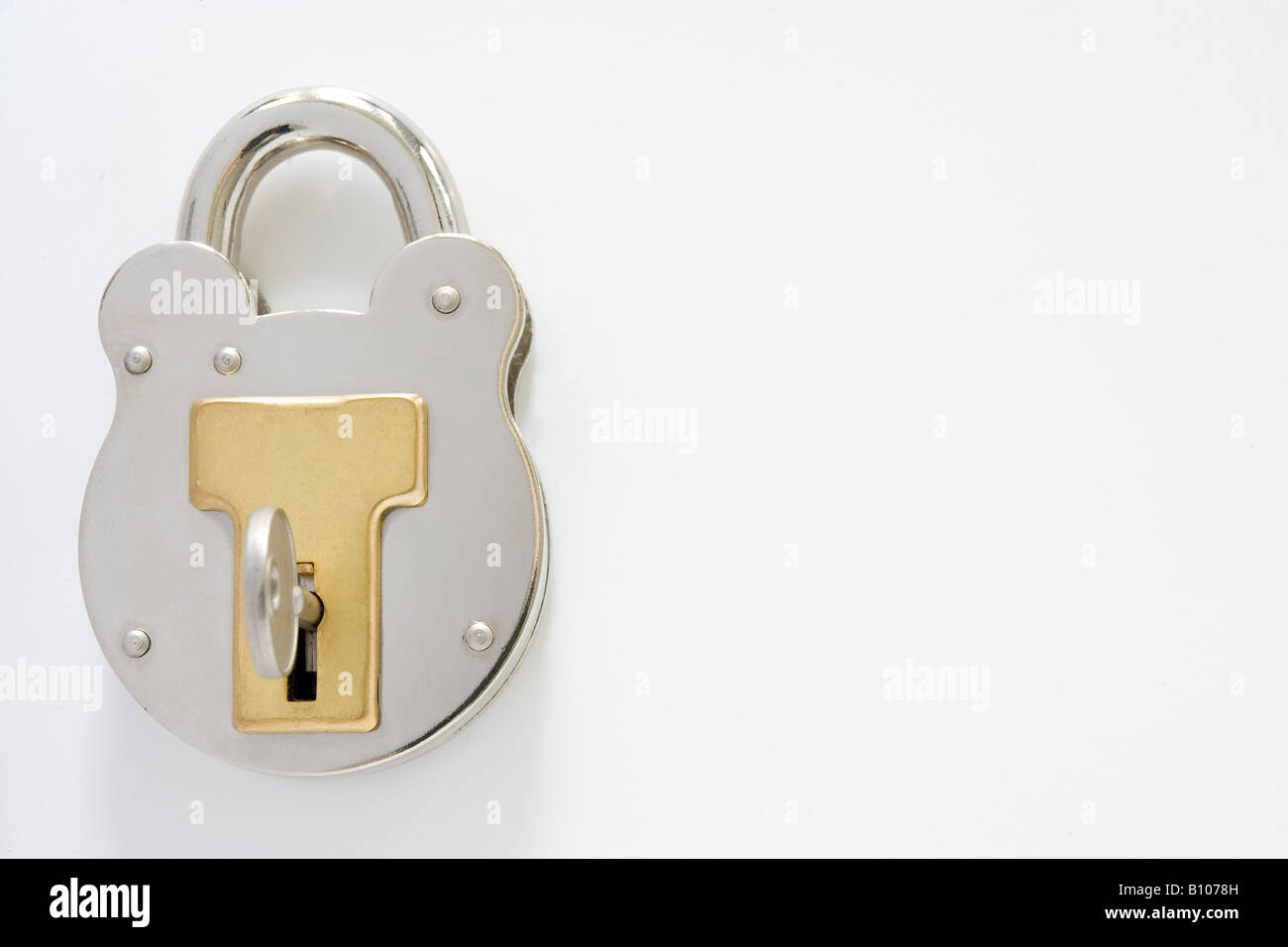 locked padlock with key and room for copy clipping path Stock Photo - Alamy
