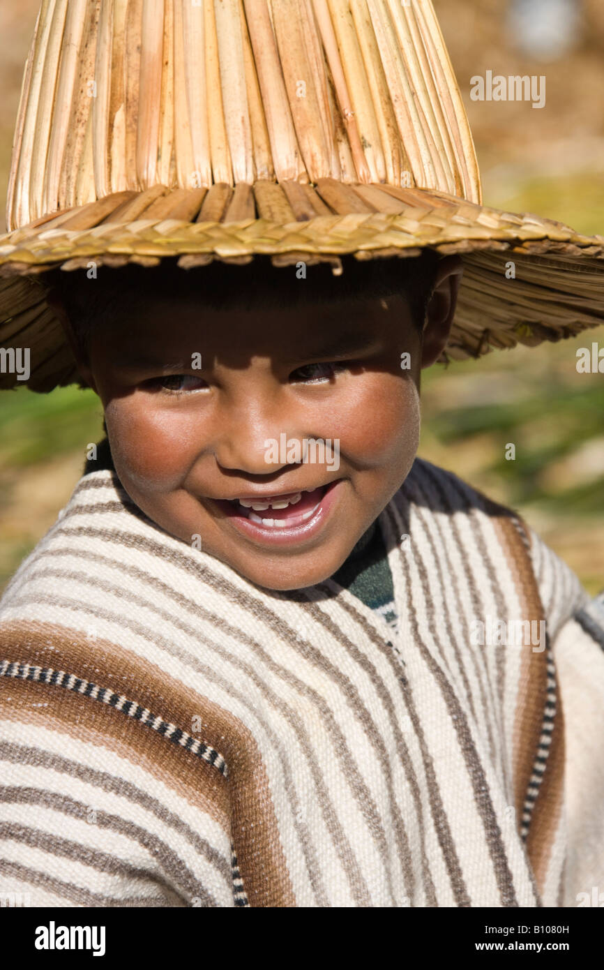 Local boy at a traditional Urus Iruitos floating reed village on the ...