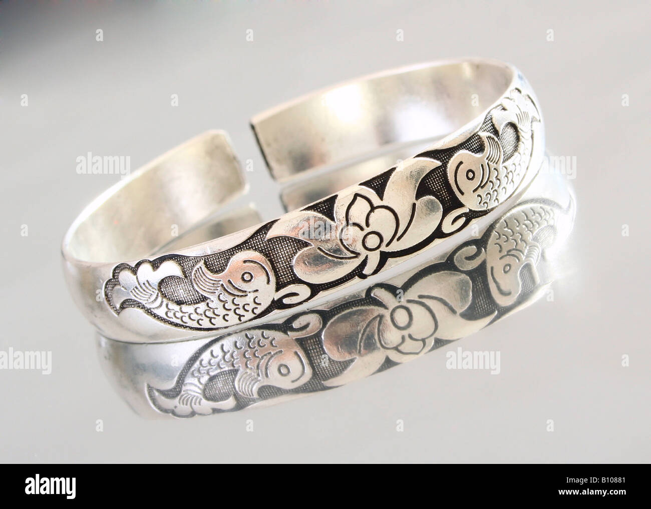 Carved silver bracelet hi-res stock photography and images - Alamy