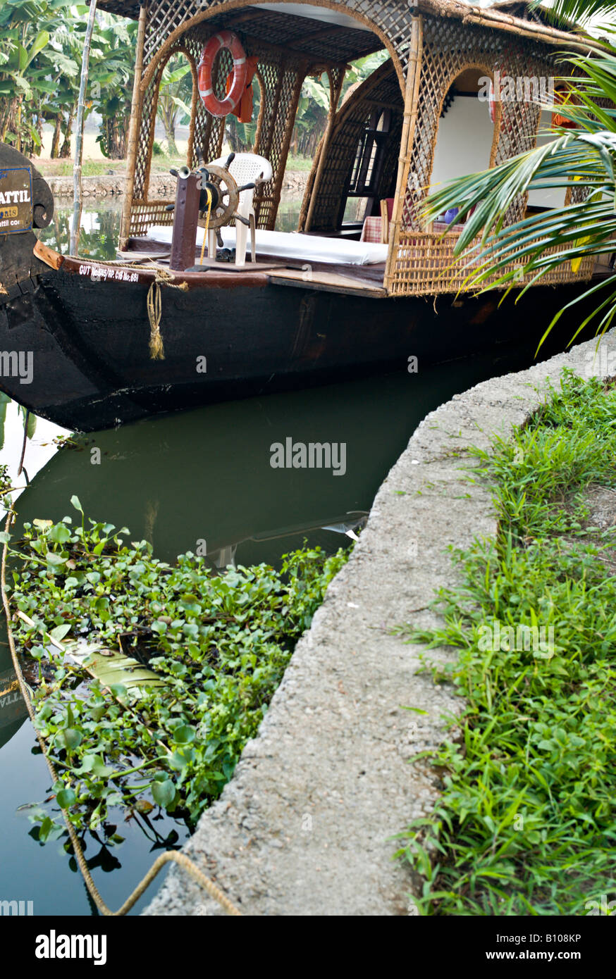 INDIA KERALA Renovated rice boat on canal in the backwaters of Kerala ...