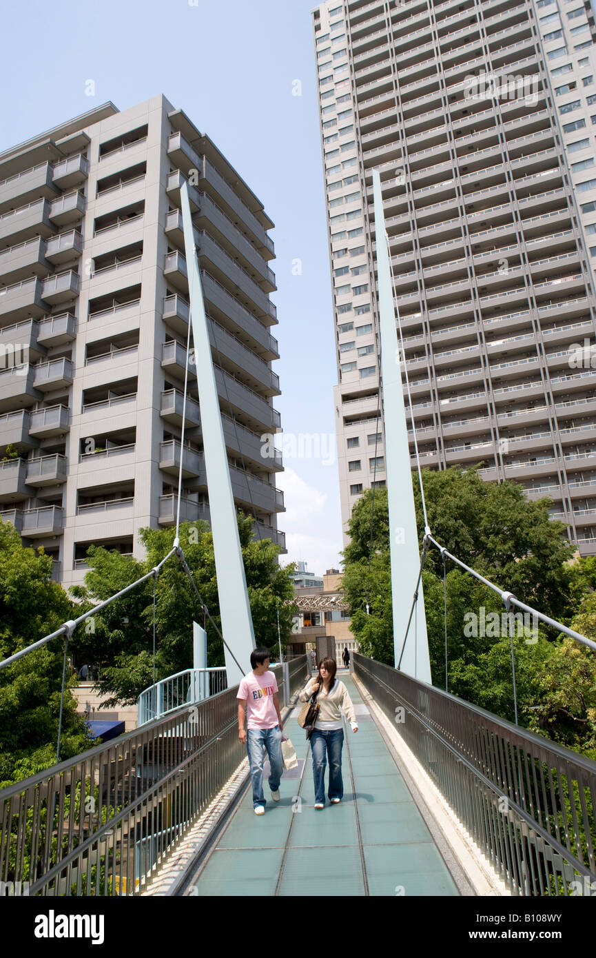 Modern high rise apartment buildings and bridge in fashionable ...