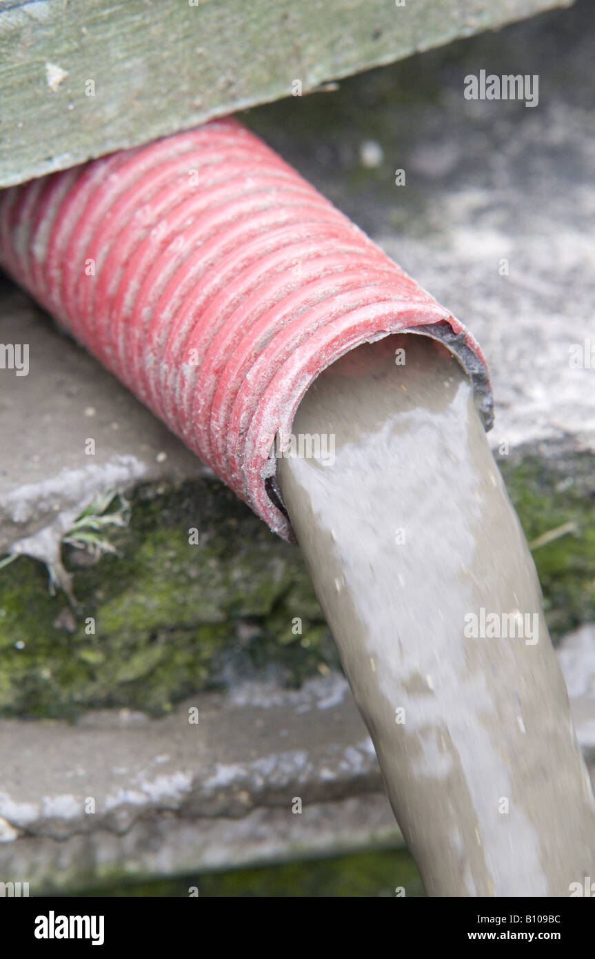 wastewater treatment sludge going into a sludge digester Stock Photo ...