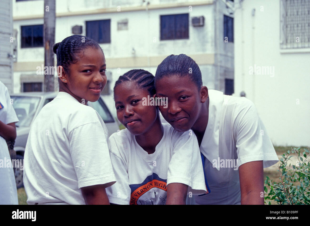 Black high school girls wearing white uniforms, Belize City Stock Photo ...