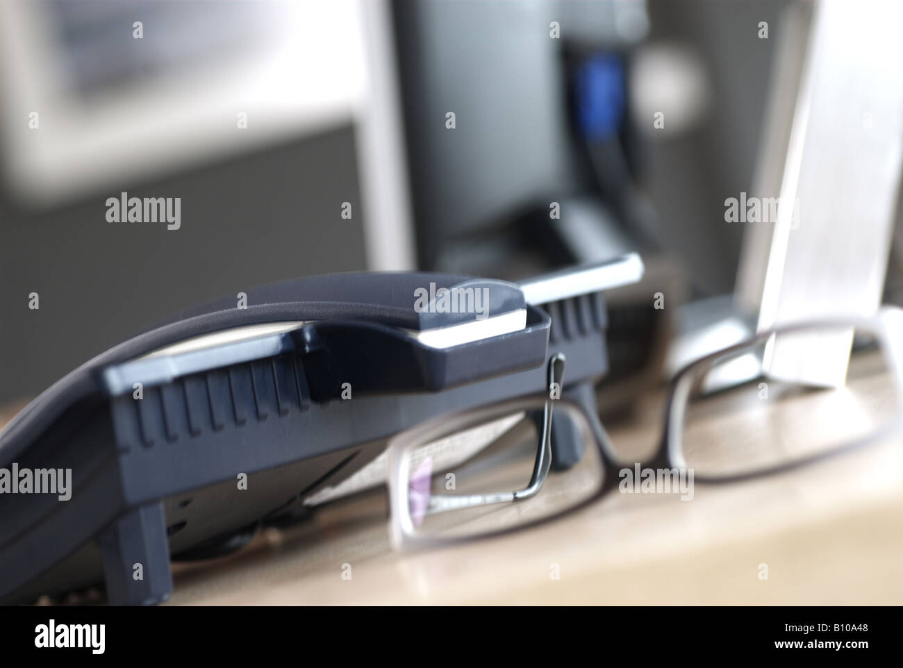 Glasses in a desk Stock Photo - Alamy