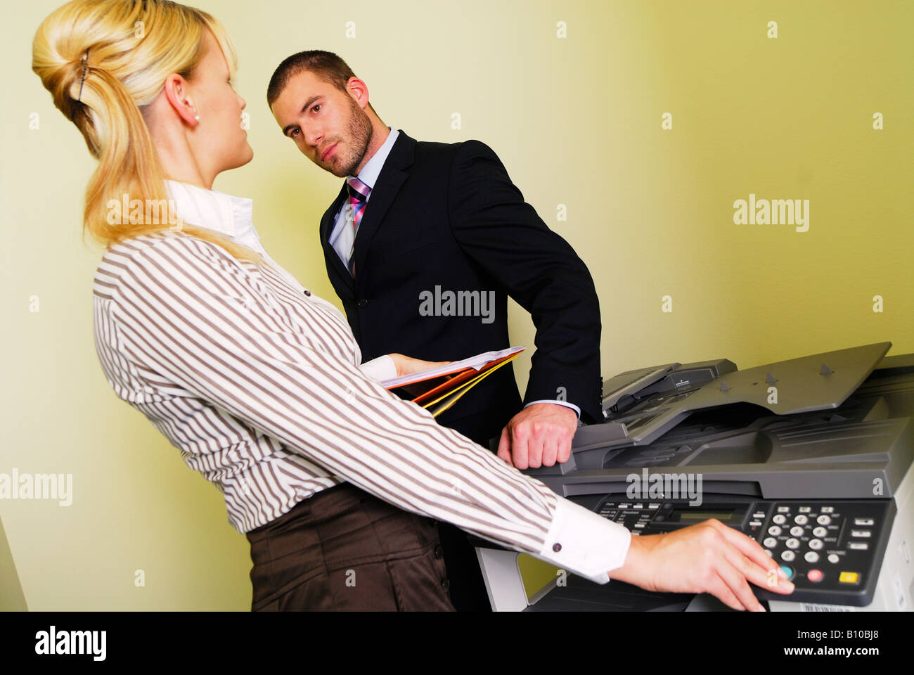 Young People at Copy Room Stock Photo - Alamy