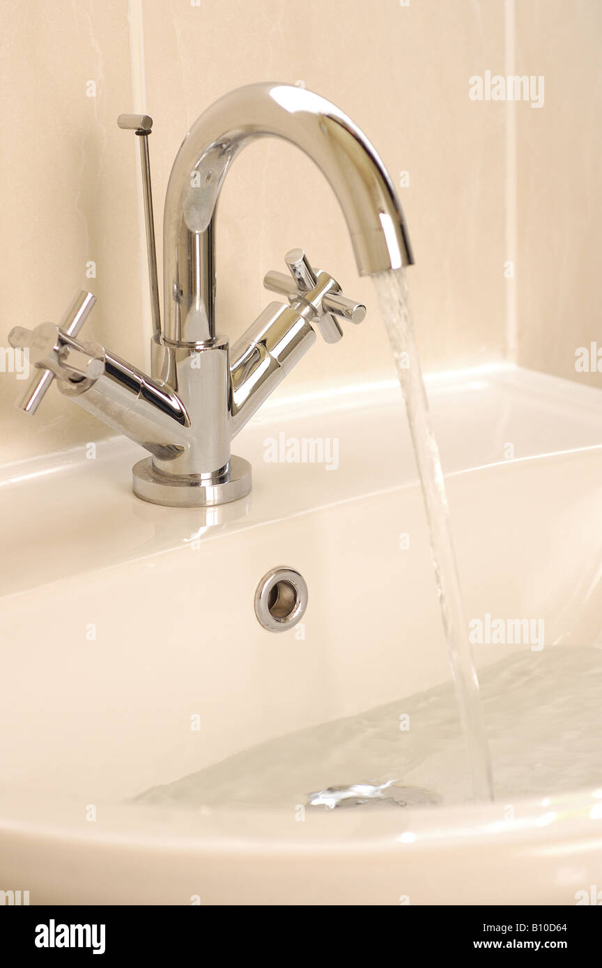 Pouring water into a wash basin hi-res stock photography and images - Alamy