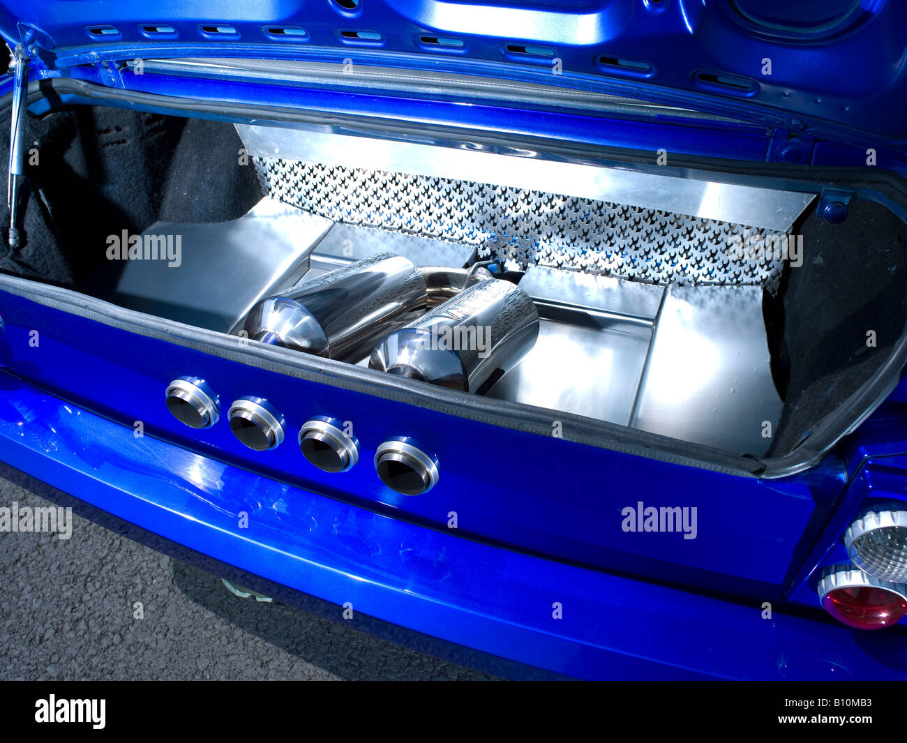 exhaust muffler silencers in aluminium aluminum trunk boot of blue ...