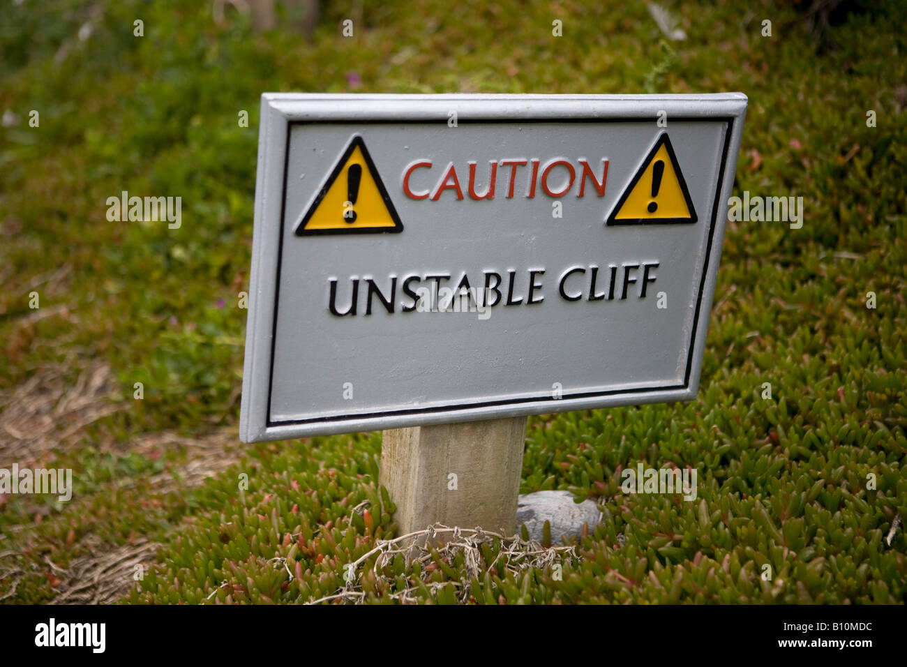 Warning unstable cliffs sign Stock Photo - Alamy