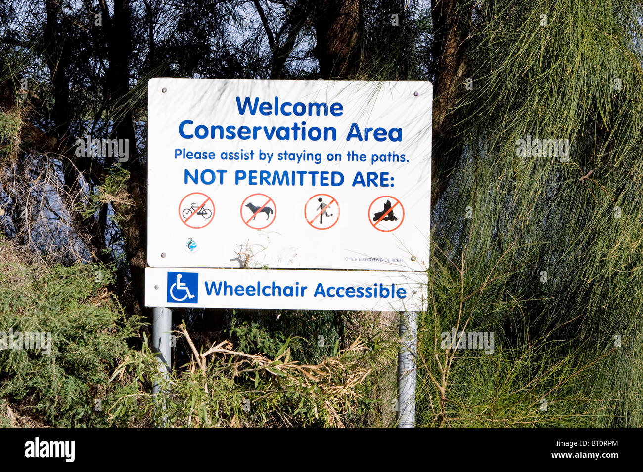 A wheelchair accessible Conservation Area sign with cycling, running ...