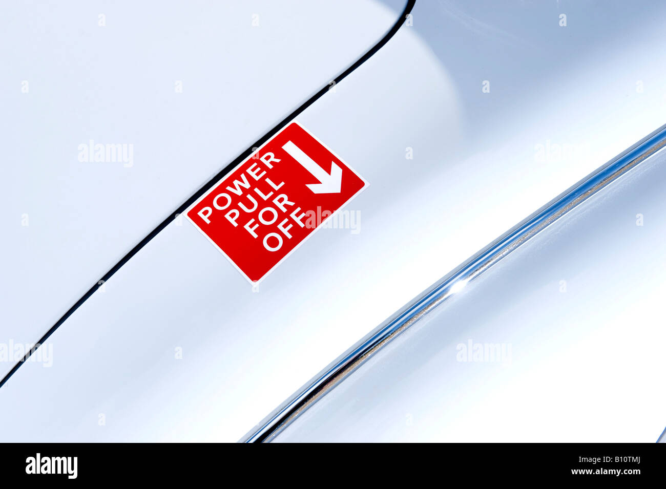 power pull for off sign on jaguar classic vintage racing car in white ...