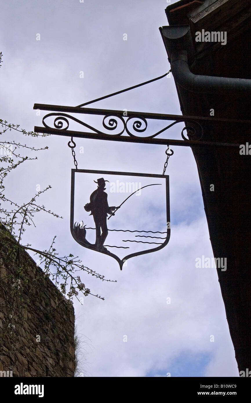 Wrought iron hanging signs hi-res stock photography and images - Alamy