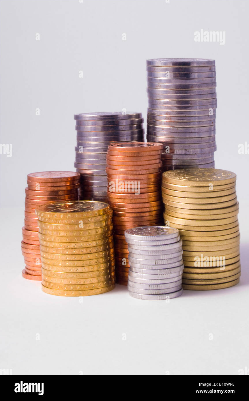Piles of coins Stock Photo - Alamy
