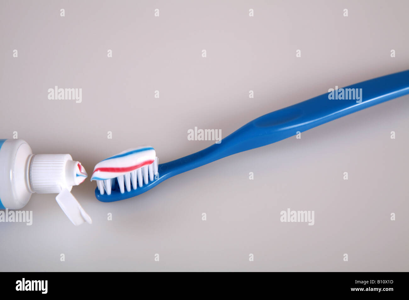 Red tube of toothpaste hi-res stock photography and images - Alamy