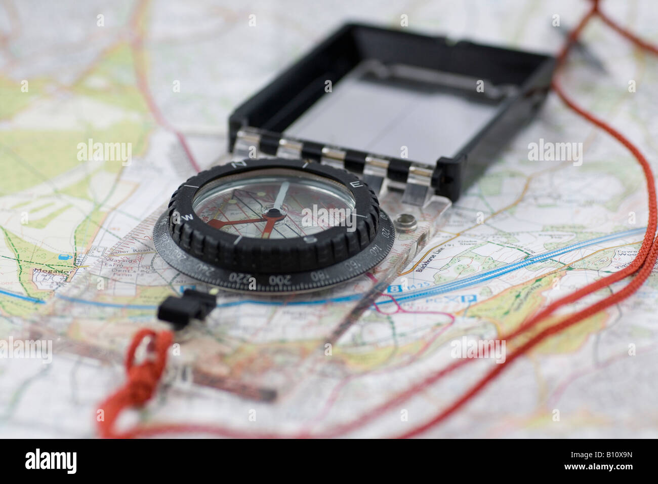 Map and compass Stock Photo - Alamy