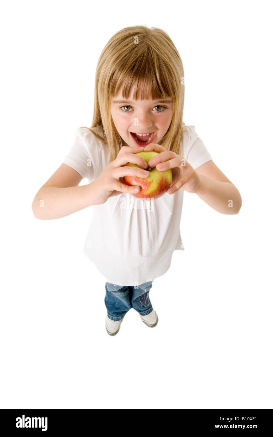 girl young child kid eating an apple fresh fruit diet good food healthy ...