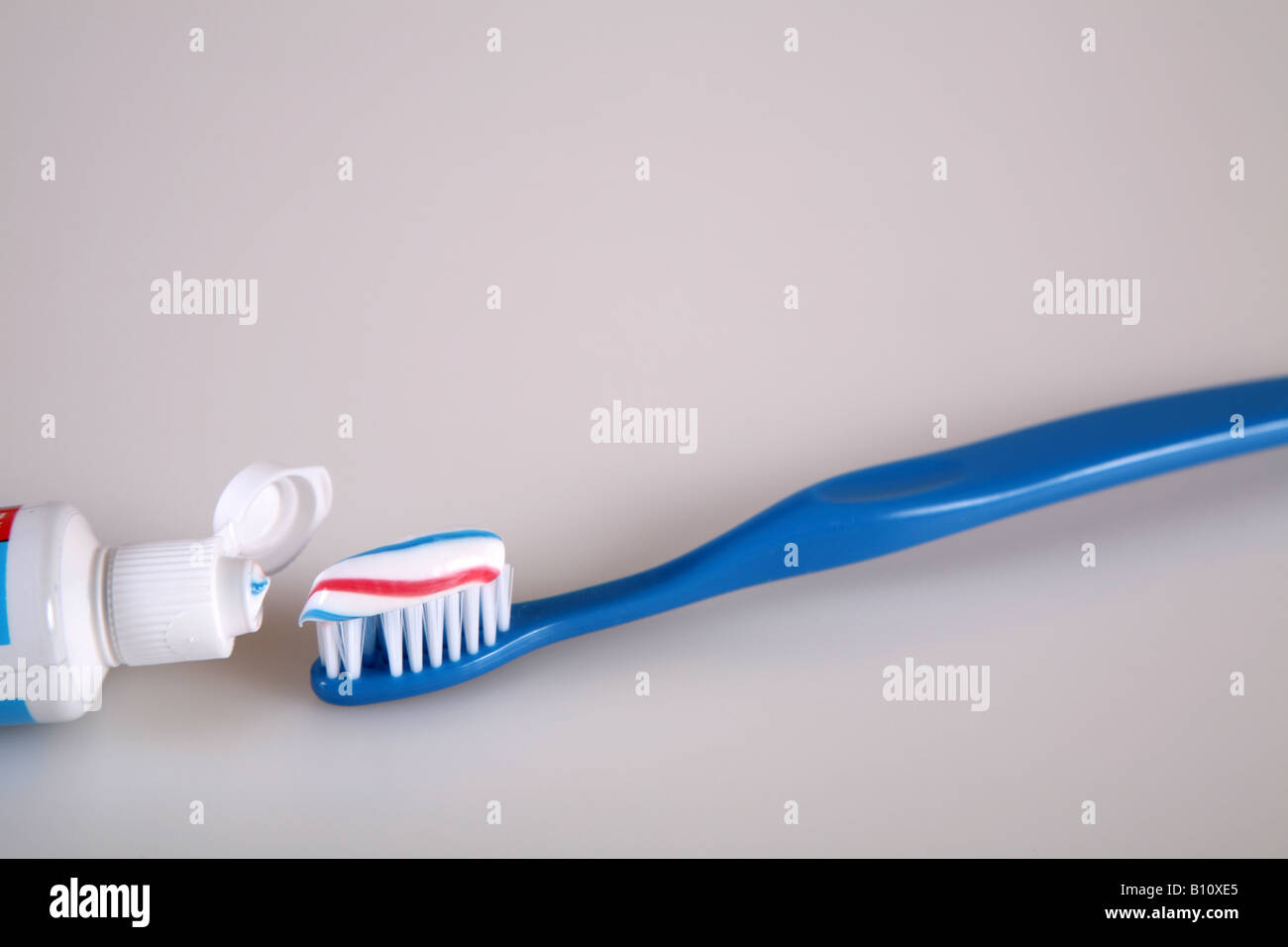 Red tube of toothpaste hi-res stock photography and images - Alamy