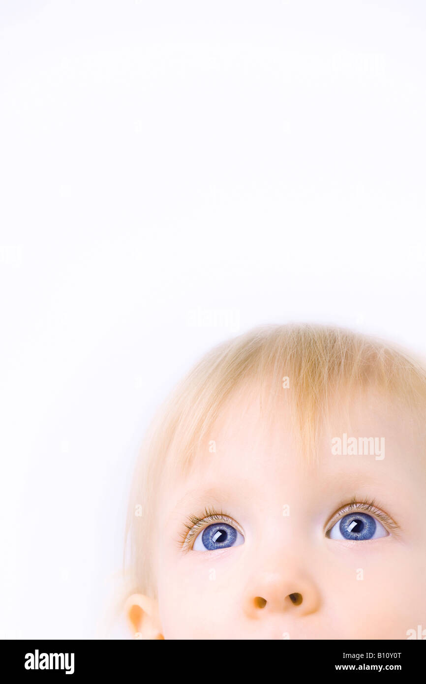 Child looking up Stock Photo - Alamy