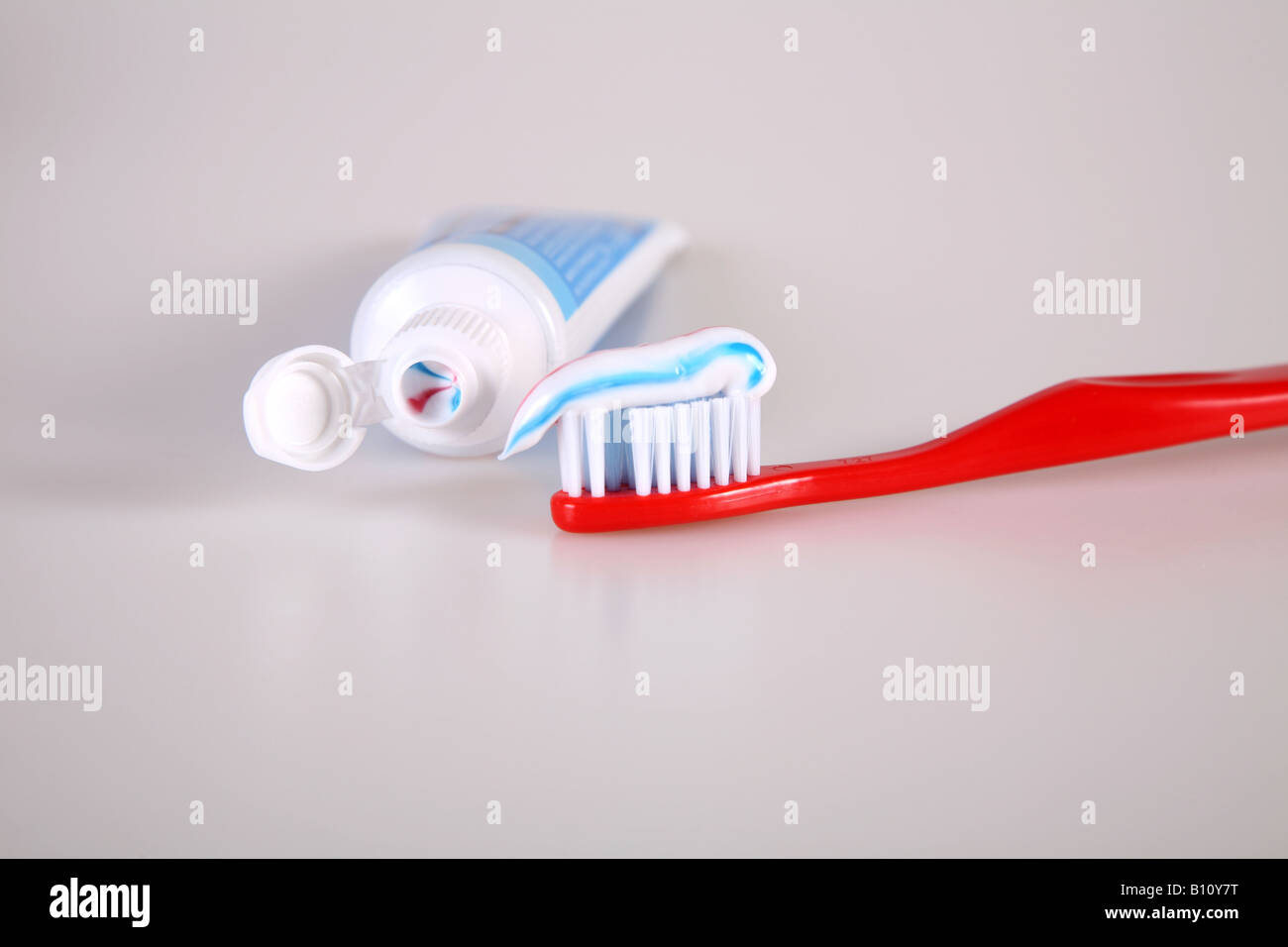 Toothbrush and toothpaste Stock Photo - Alamy