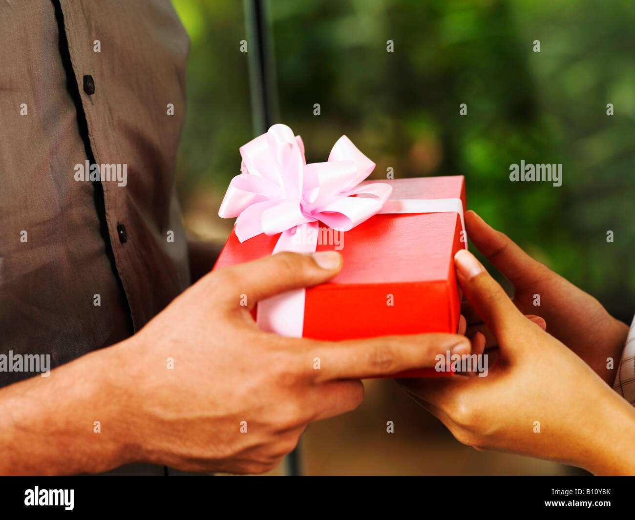 Giving and receiving Stock Photo - Alamy