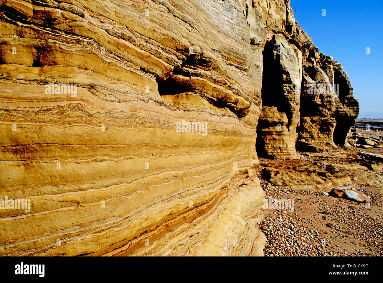 Rock formation by the sea Stock Photo - Alamy
