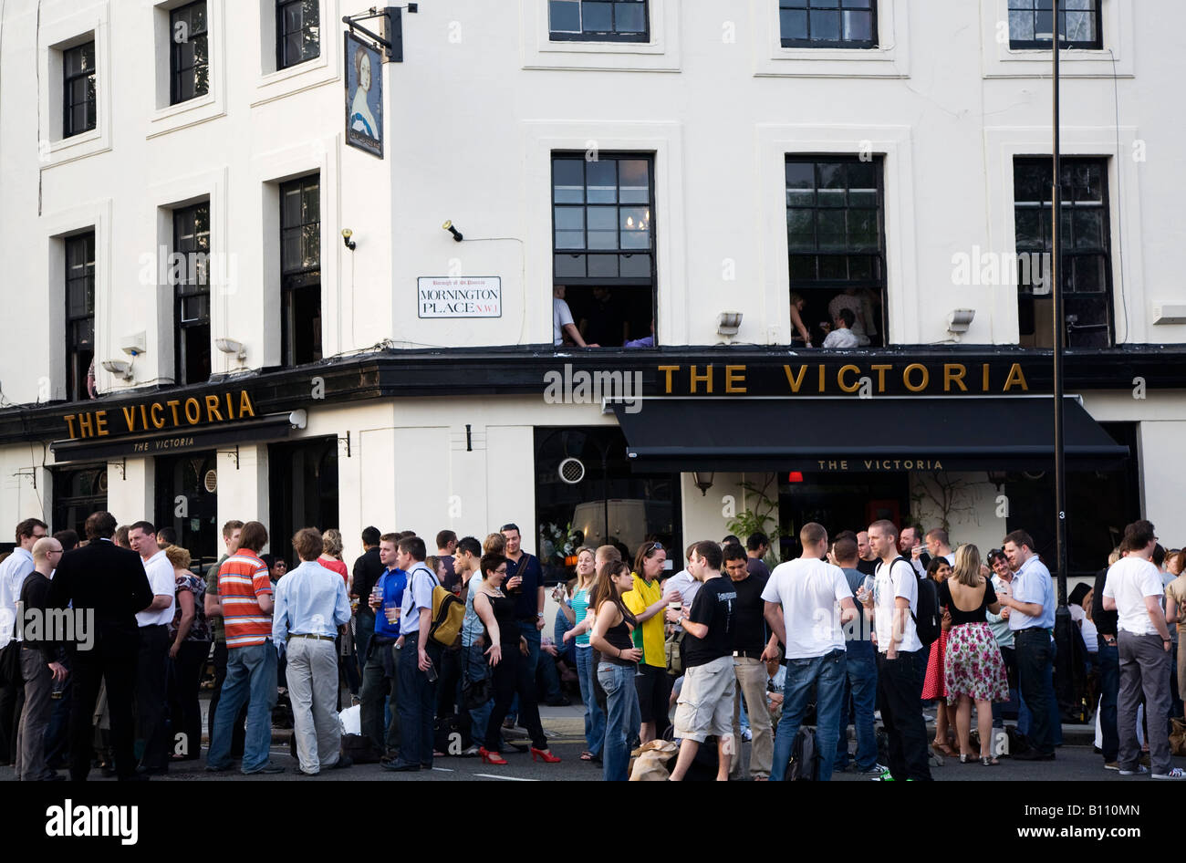 People drinking outside Victoria pub, Camden, NW1, England Stock Photo ...