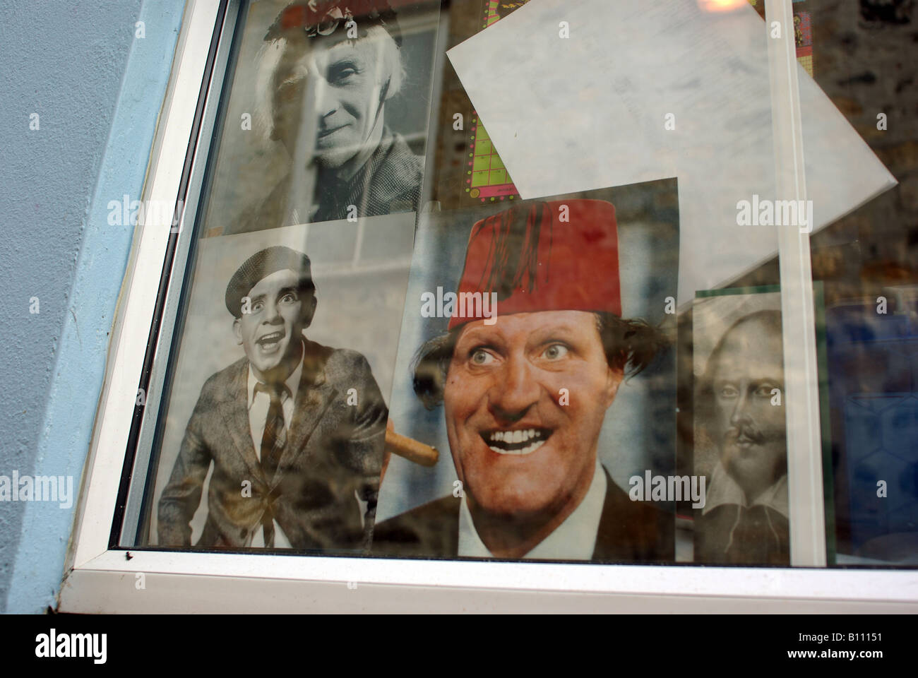 Pictures of famous British comics in a house window St. Ives Cornwall ...