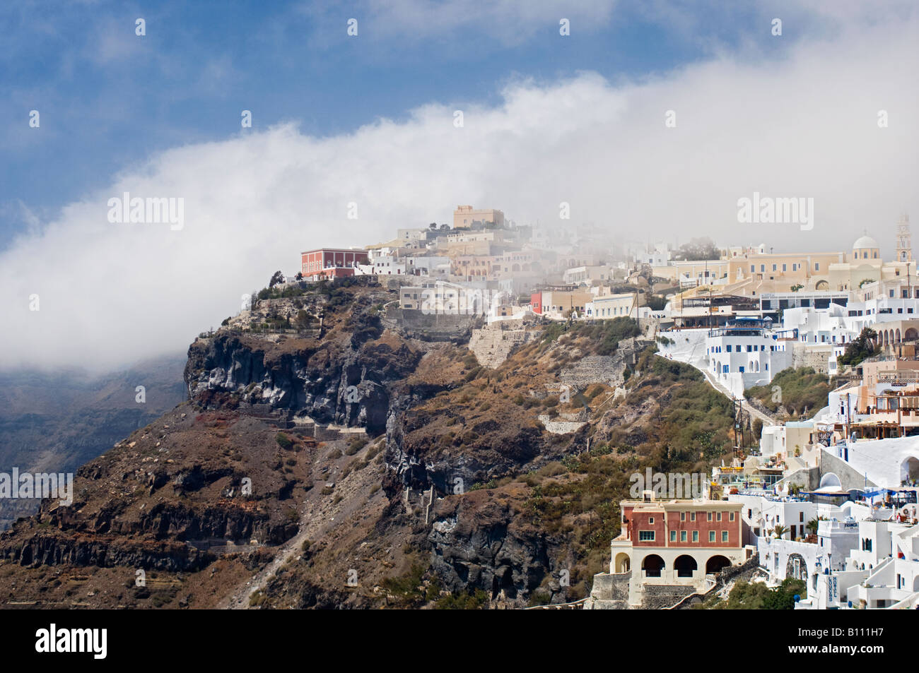 View of the town of Thiri covered in a blanket of cloud on the cliffs ...