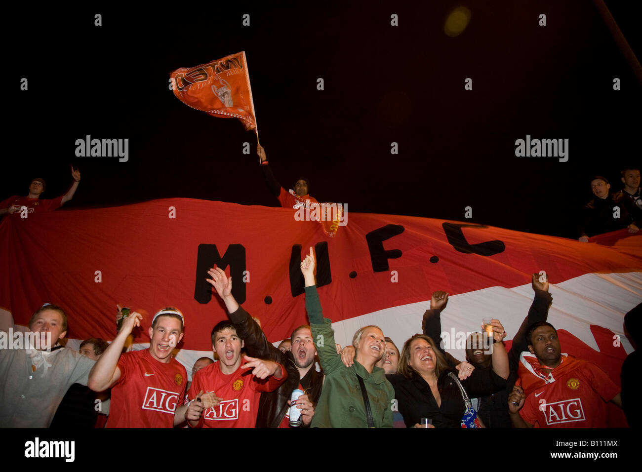Manchester fans stadium flags hi-res stock photography and images - Alamy