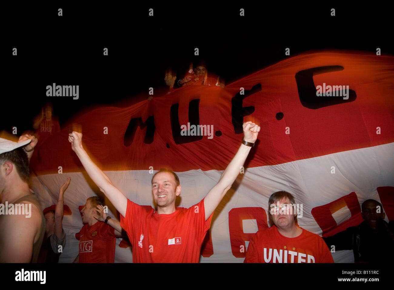 Manchester Fans Stadium Flags High Resolution Stock Photography and ...