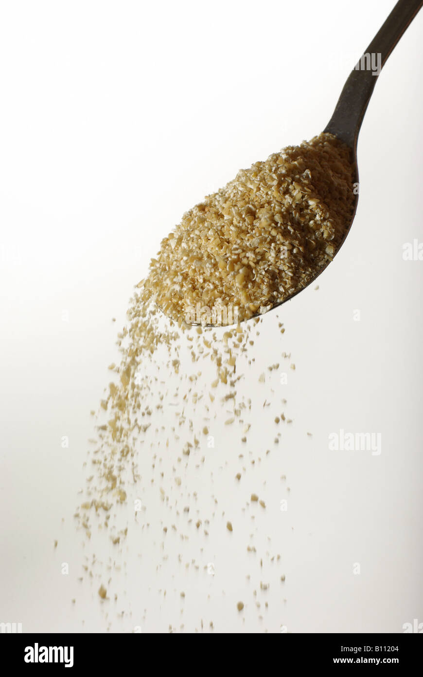 Oat Bran on spoon Stock Photo - Alamy