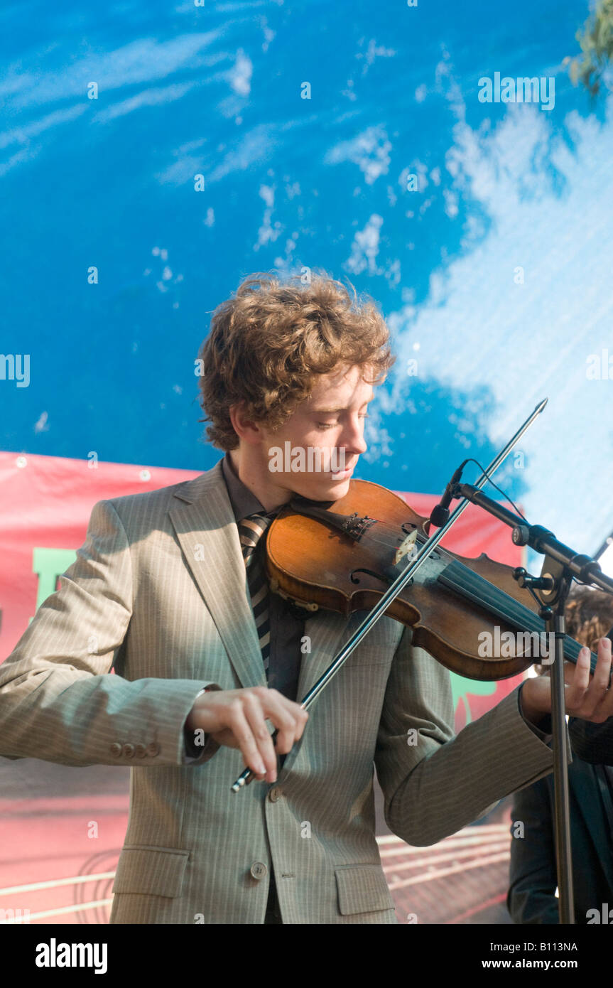 the Abrams Brothers on stage at an outdoor concert Stock Photo - Alamy