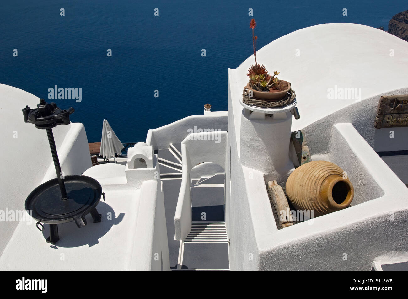 View over the White Rooftops of Santorini into the Bay. Thira ...