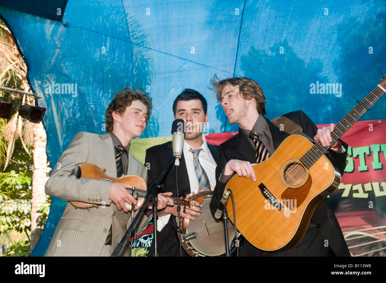 the Abrams Brothers on stage at an outdoor concert Stock Photo - Alamy